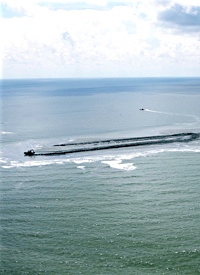 Louisiana Builds Berm "Islands" to Trap Oil - The New American